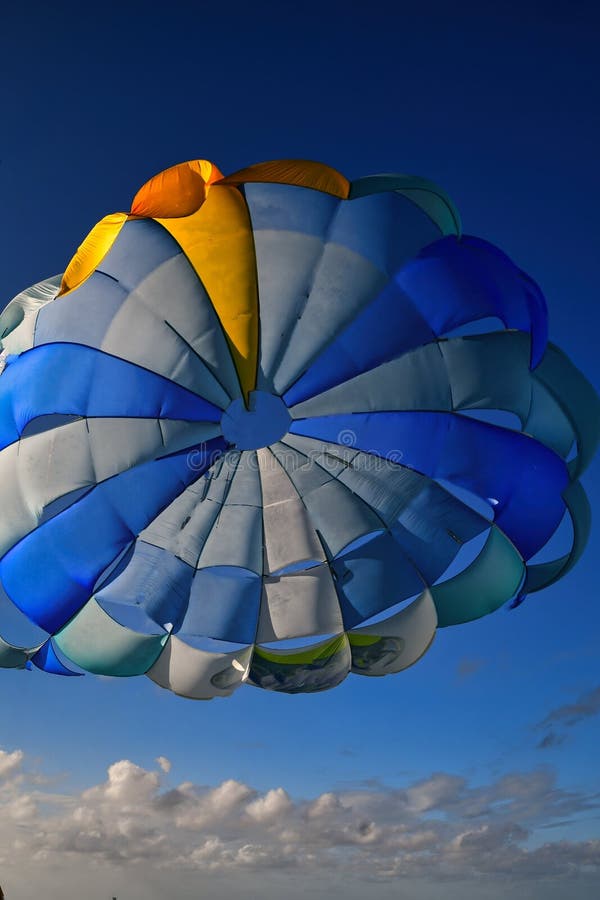 Parachute Blue Sky and a Few Clouds Stock Photo - Image of clouds ... Parachute Blue Sky and a Few Clouds Stock Photo - Image of clouds ...