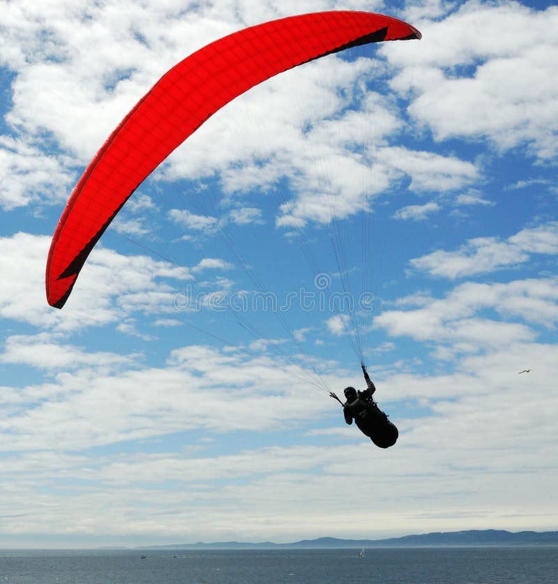 Parachute Flying Above the Ocean Stock Photo - Image of flight, aerial ...