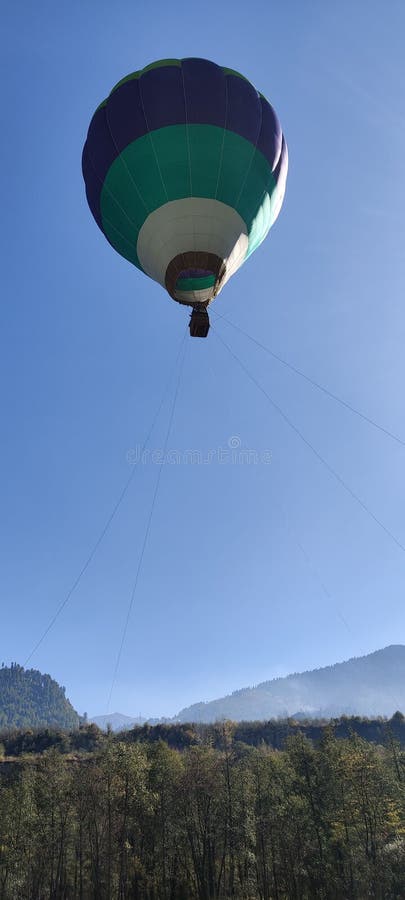 Parachute Flying Over Dense Trees Stock Image - Image of outdoors ...
