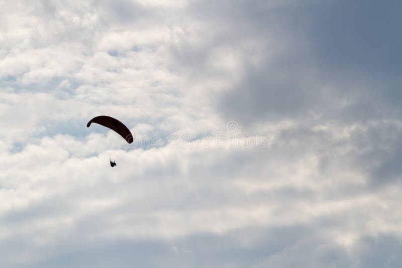 Parachute and Human Silhouette. Blue Sky Stock Photo - Image of ...
