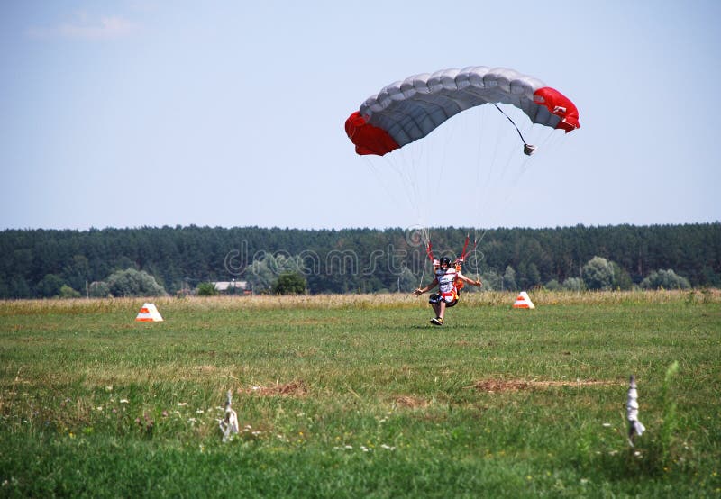 Parachuter Alighting on the Field. Stock Image - Image of hanging ...