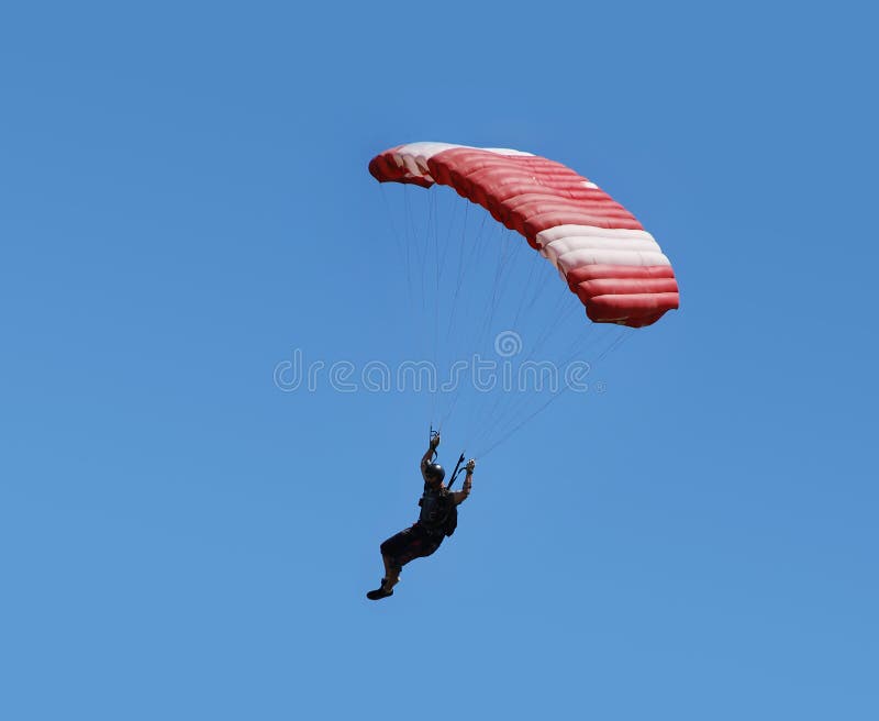 Parachuter in the Blue Sky. Stock Photo - Image of blue, action: 22172568