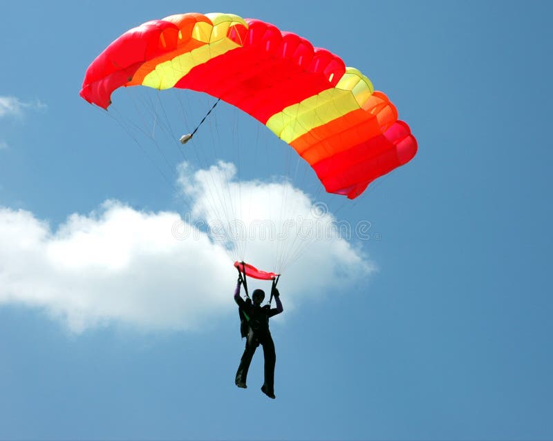 Parachuter With A Yellow-red Parachute Stock Photo - Image of ...
