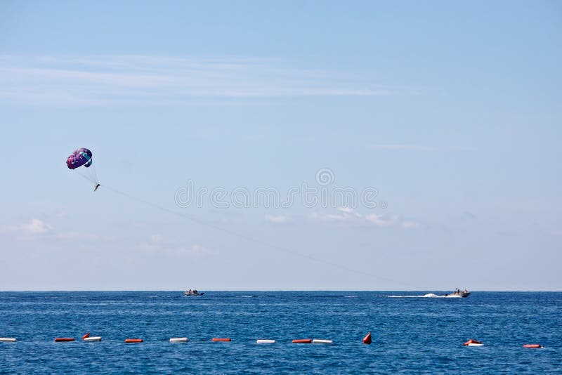 Parachuting at sea stock image. Image of summer, water - 40239395