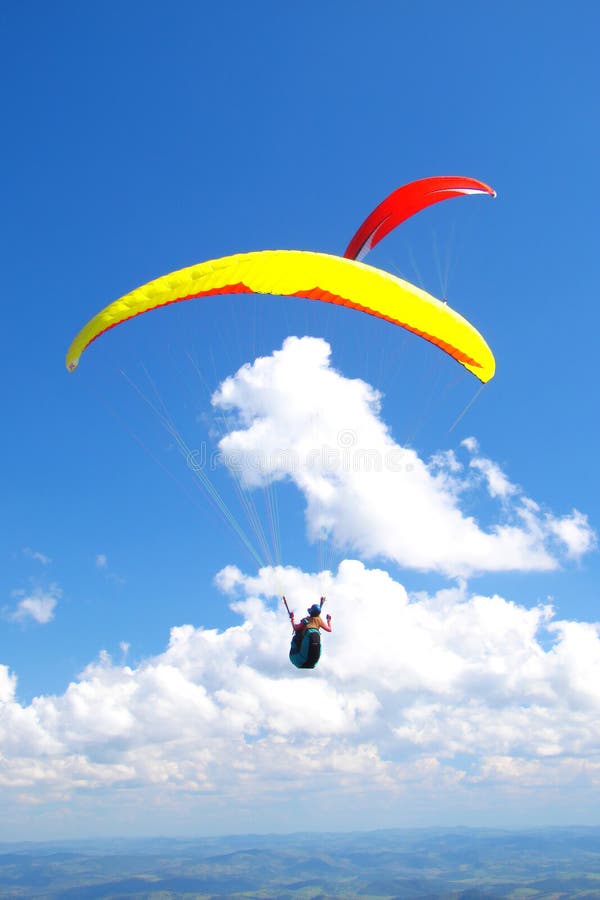 Paraglider on Bright Blue Sky Stock Photo - Image of parachute, cells ...
