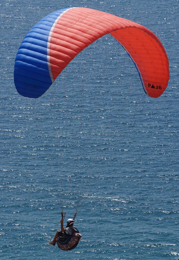 Paraglider Agains Sunny Ocean Stock Photo - Image of flying, glider ...
