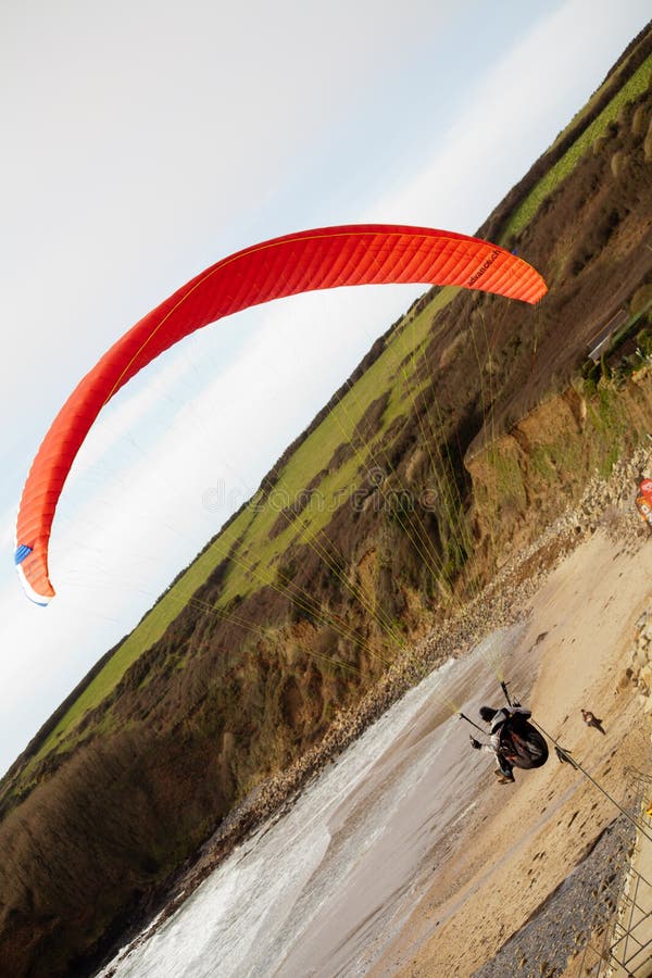 Paraglider Flying Low Over a Cornish Beach Editorial Stock Photo ...