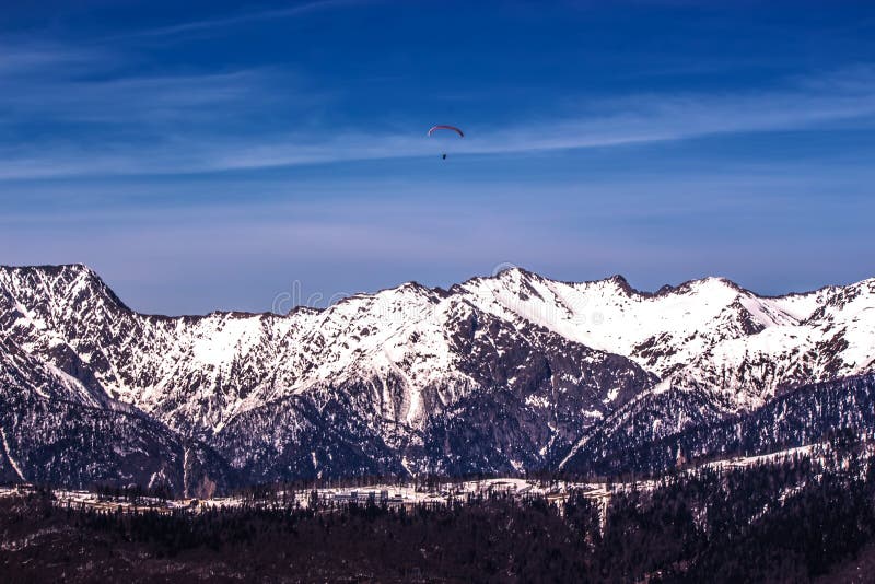Paraglider Dome in the Sky Above the Ridge Stock Photo - Image of ridge ...