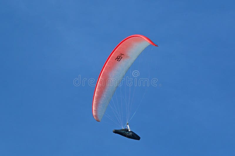 Paraglider Flying in a Blue Sky Stock Photo - Image of lines, adventure ...