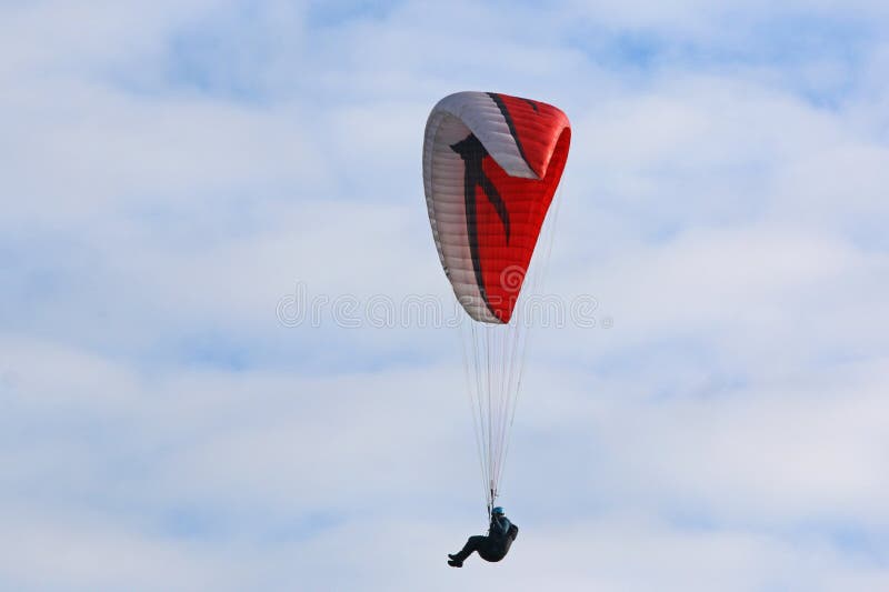 Paraglider Flying in a Cloudy Sky Stock Photo - Image of hill, sport ...