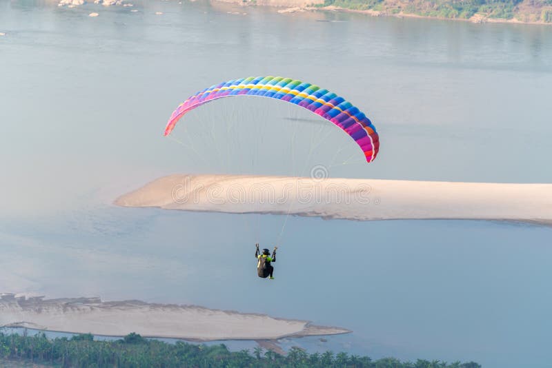 Paraglider Flying on Mekong River in Summer Day Stock Photo - Image of ...