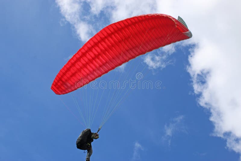 Paraglider Flying Wing in a Blue Sky Stock Photo - Image of flying ...