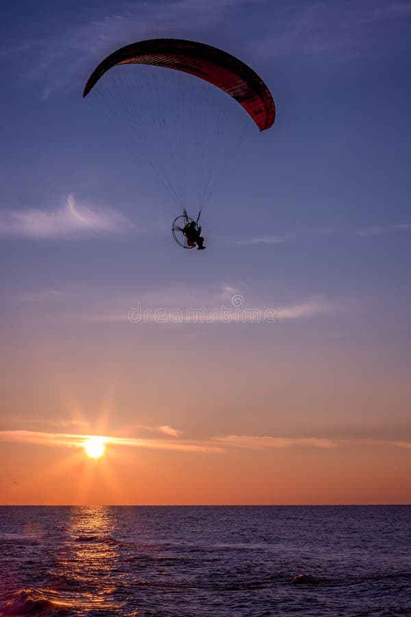 Paraglider Flying at Sunset Stock Image - Image of leisure, glider ...