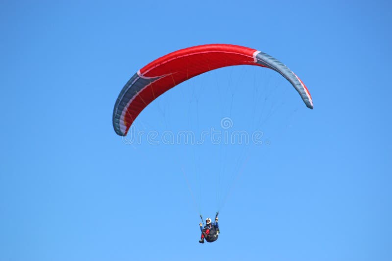 Paraglider Flying Wing in a Blue Sky Stock Photo - Image of dual ...