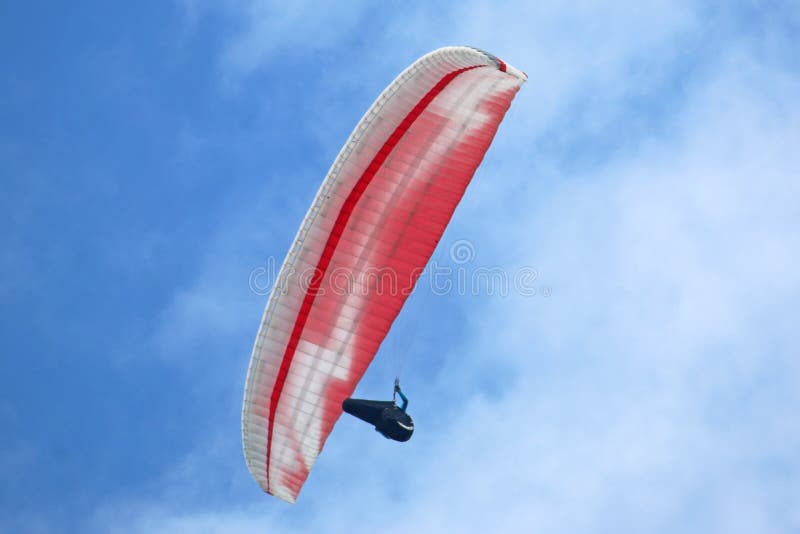 Paraglider Flying Wing in a Blue Sky Stock Photo - Image of paraglide ...