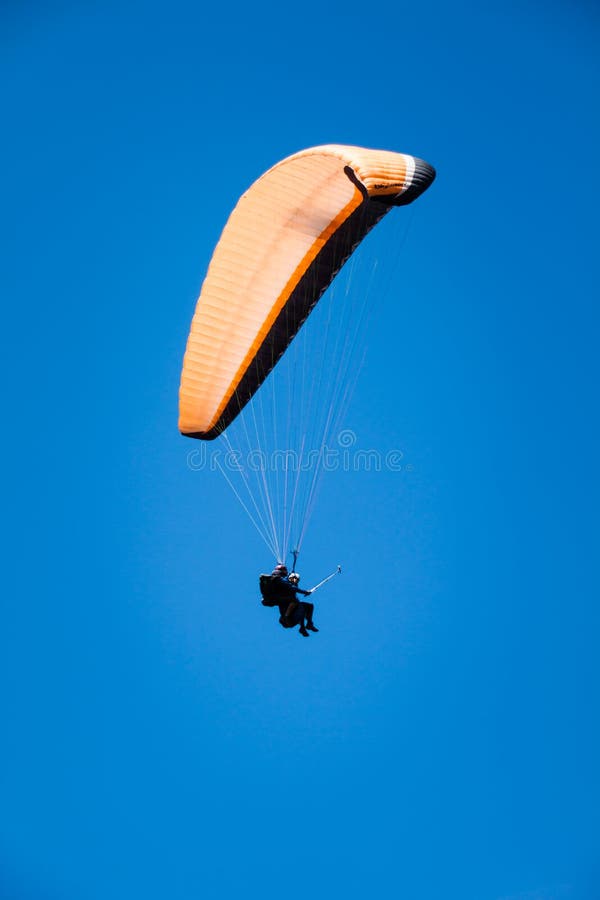Paraglider Instructor Flying Over Annecy Lake with Customer in Blue ...