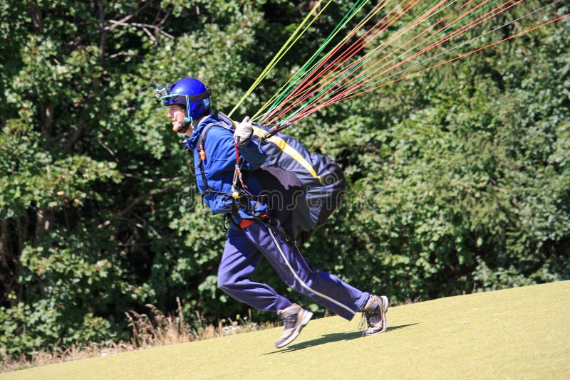 Paraglider launching stock image. Image of flier, wing - 90754085