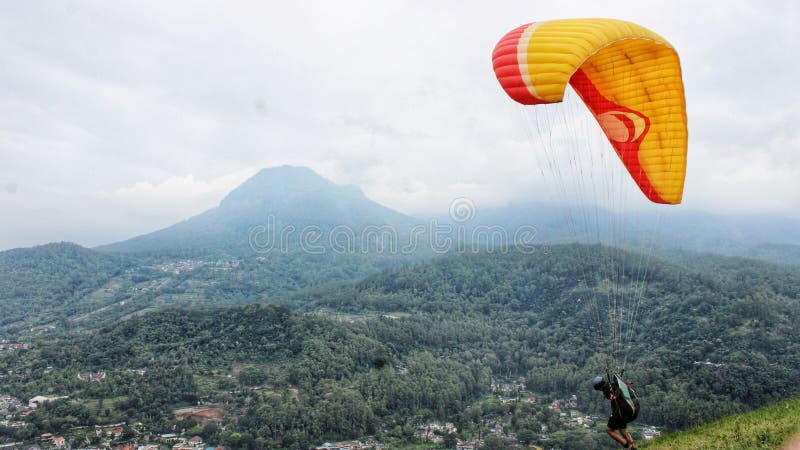 Paraglider Pilot Flying after Taking Off from Hill Stock Image - Image ...