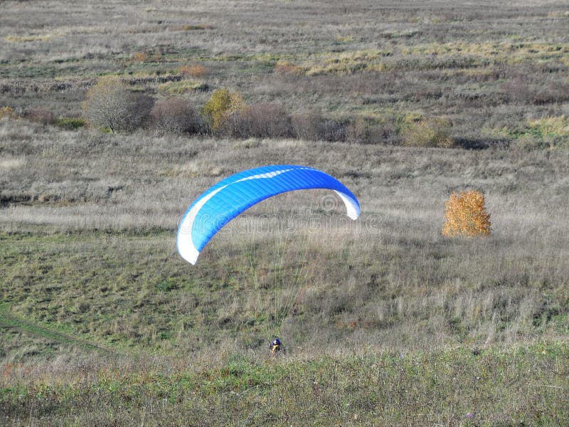 Paraglider pilot stock photo. Image of wing, flying, glider - 60804438