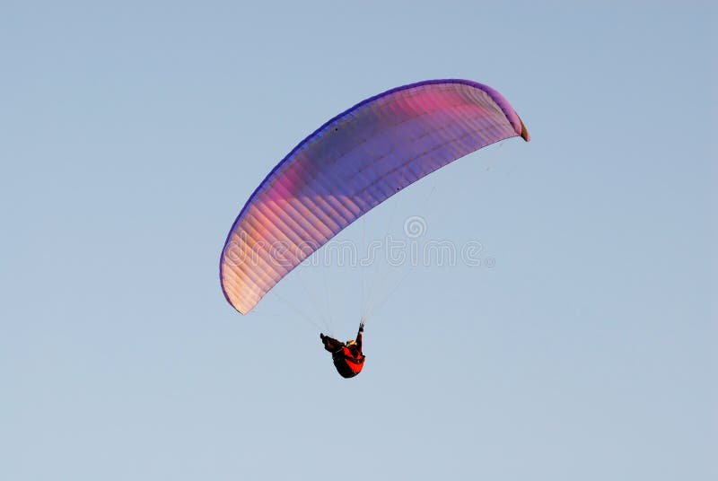 Paraglider on Bright Blue Sky Stock Photo - Image of parachute, cells ...
