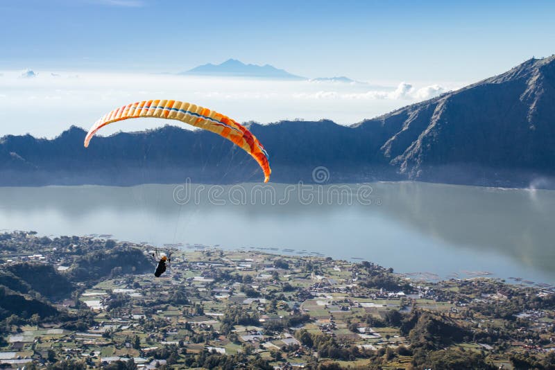 Paraglider in the Sky. the Sportsman Flying on a Paraglider. Stock ...