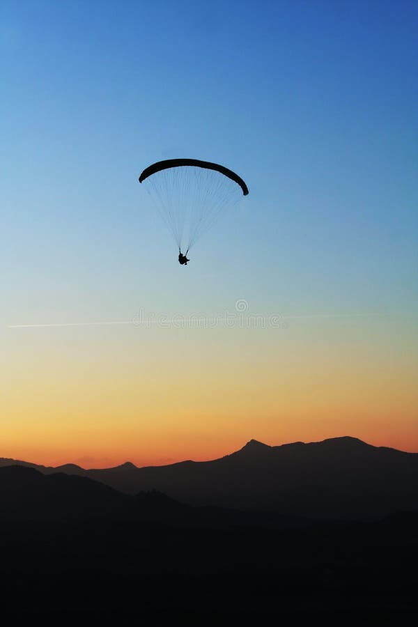 Paraglider on sunset stock image. Image of paraglide, active - 6752643