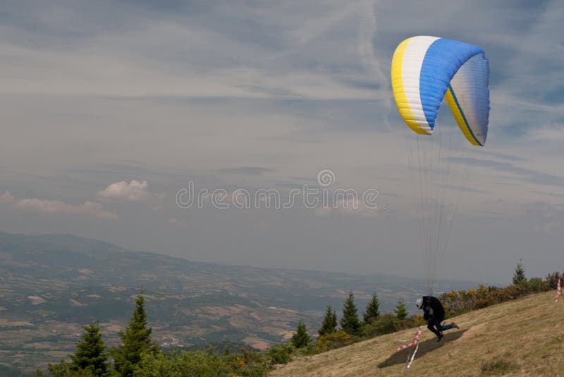 Paraglider taking off stock photo. Image of aviation - 23716634