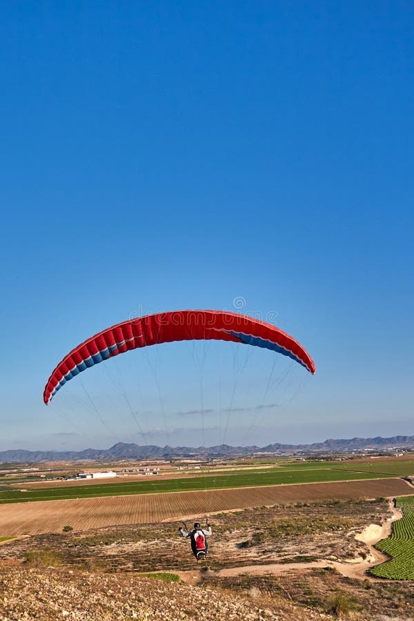 Paraglider Taking Off from a Mountain Stock Image - Image of mountain ...
