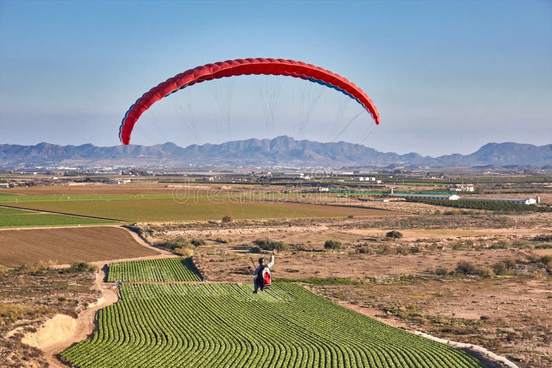 Paraglider Taking Off from a Mountain Stock Photo - Image of solitude ...