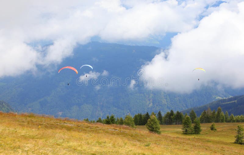 Paragliders Even Have Two People Flying at the Same Time in the Clouds ...