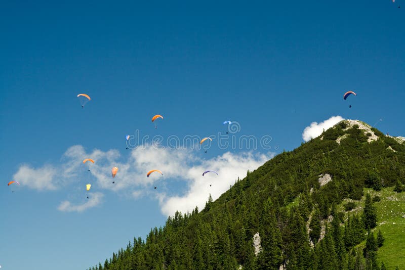Paragliding in the Alps stock photo. Image of paragliding - 6162516