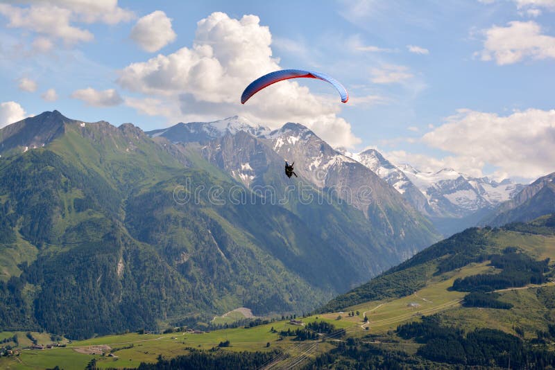 Paragliding in the alps stock image. Image of sports - 43178563