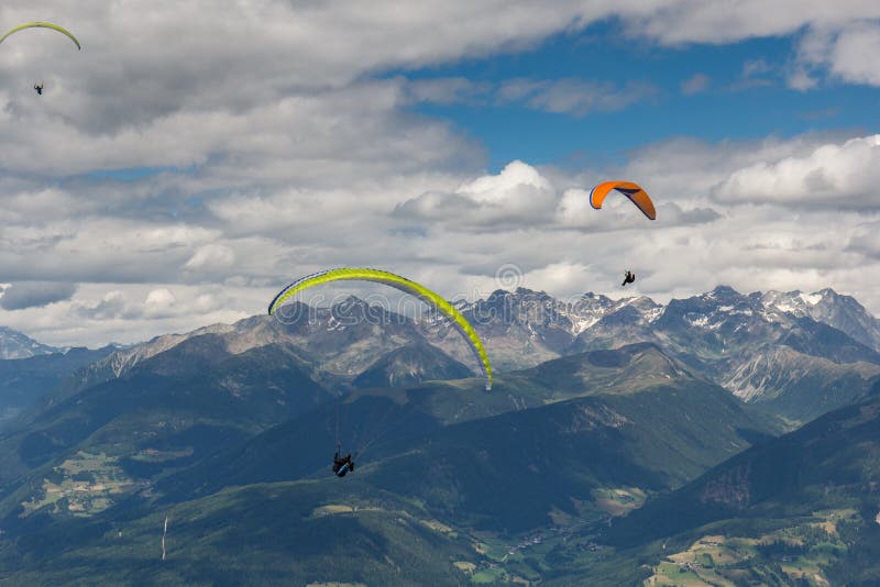 Paragliding Flying through the Alps Stock Image - Image of glider, high ...