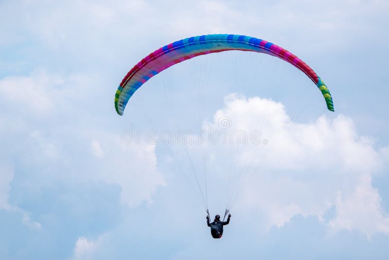 Paragliding Flying with Parachutes in the Clouds Stock Photo - Image of ...