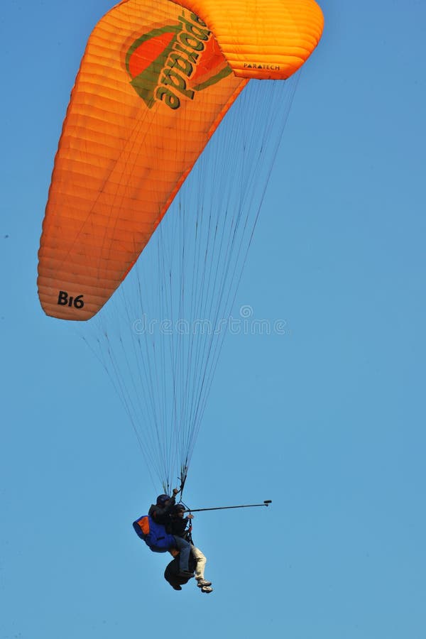 Paragliding Over the Ocean in the Bright Daylight Blue Sky Editorial ...