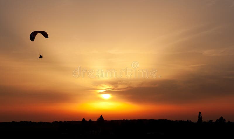 Paragliding at sunset stock image. Image of leisure, beautiful - 16425499