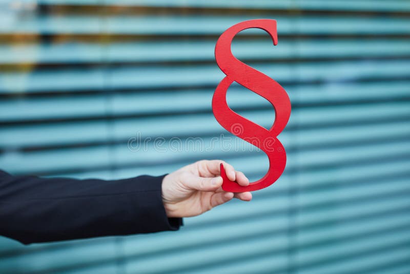 Paragraph Sign As Law and Order Concept in Front of Office Building ...