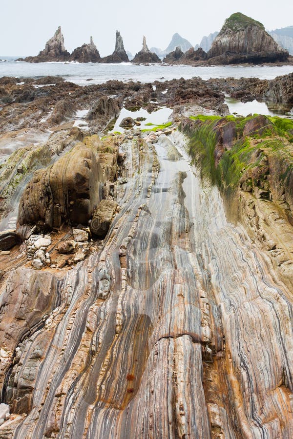 Paralell Rock Lines in a Stone Beach Stock Photo - Image of beach ...