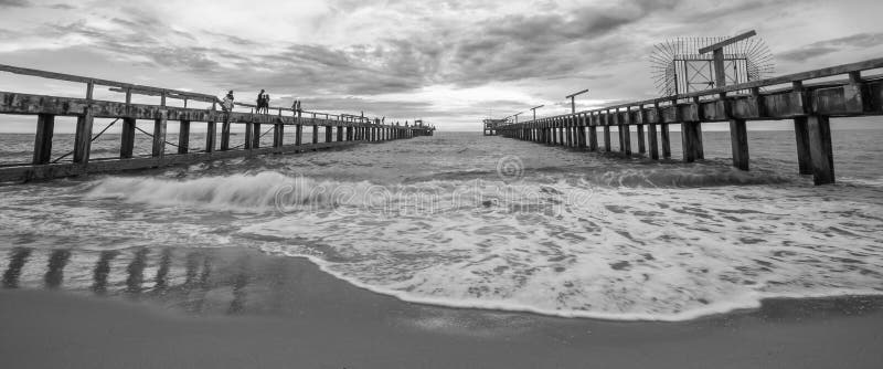 Parallel Concrete Piers on Beach and Sea Wave Stock Image - Image of water, movement: 27794339