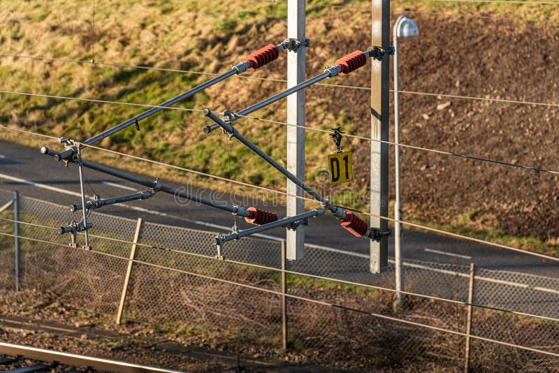 Parallel Railway Tracks and Power Lines in Low Sunlight. Stock Photo ...