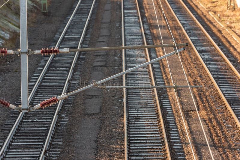 Parallel Railway Tracks and Power Lines in Low Sunlight. Stock Photo ...