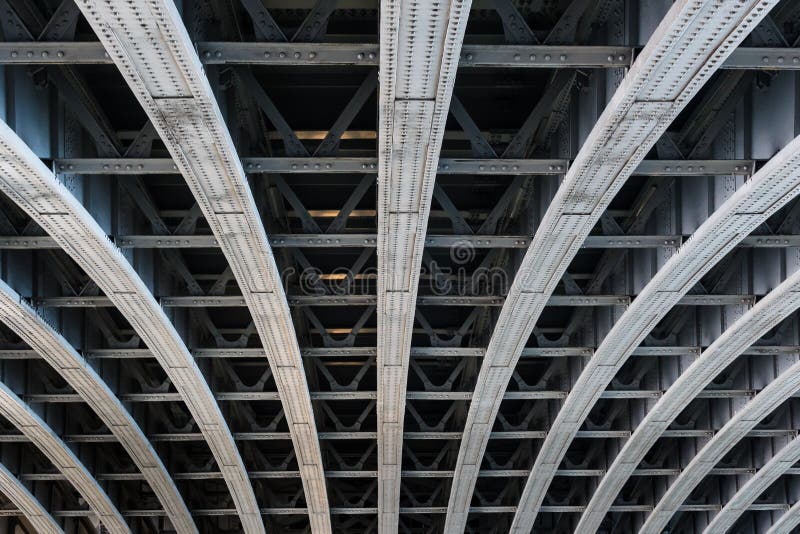 Parallel Steel Columns with Brick Background Stock Photo - Image of ...