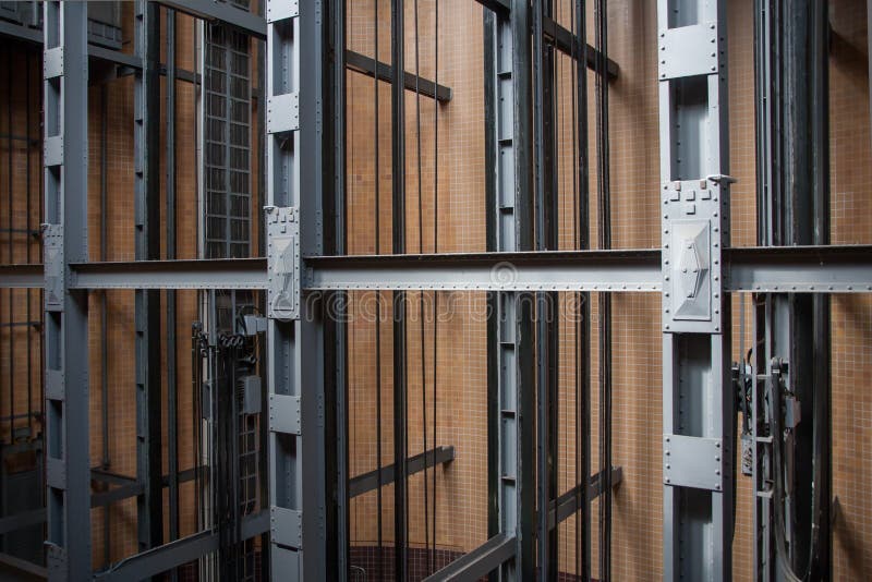 Parallel Steel Columns with Brick Background Stock Photo - Image of ...