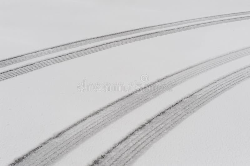 Parallel Tire Tracks in the Snow Stock Image - Image of tread, street ...