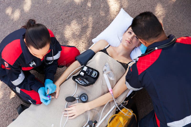 Paramedic Using Stethoscope On Patient Stock Photo - Image of nurse ...