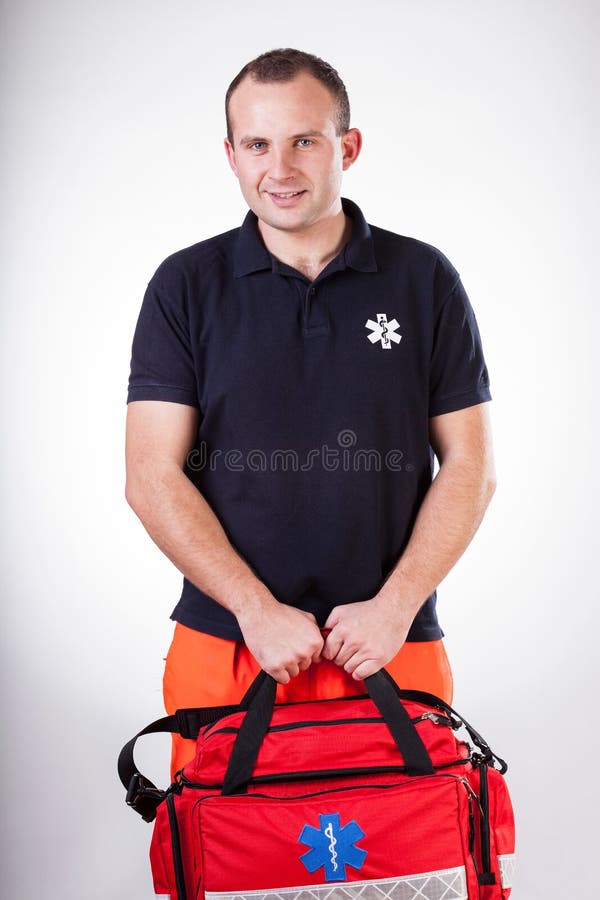 Paramedic with First Aid Kit Stock Photo - Image of caucasian, help ...