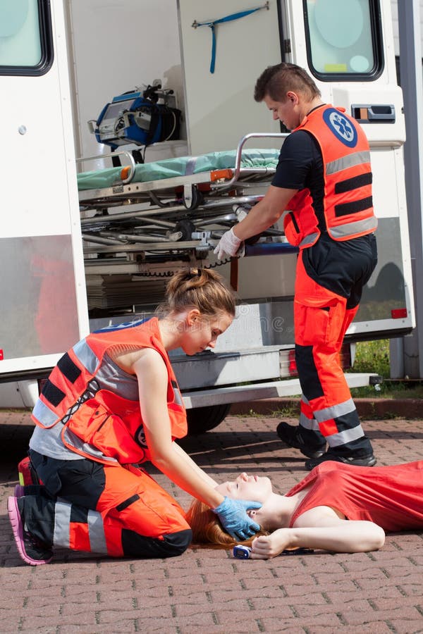 Paramedic giving first aid stock photo. Image of stabilization - 44861000