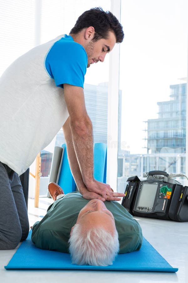 Paramedic Performing Resuscitation on the Patient Stock Image - Image ...
