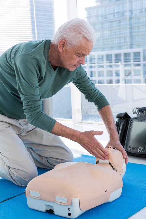 Paramedic Performing Resuscitation on Patient Stock Photo - Image of ...