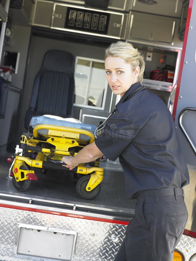 Paramedic Using Stethoscope on Patient Stock Photo - Image of nurse ...